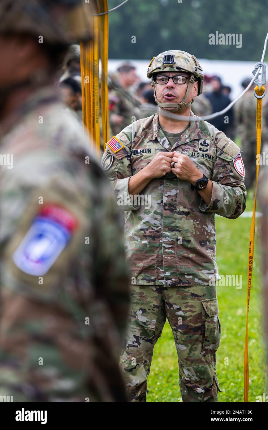 Members of Special Operations Command Europe prepare for a static line ...