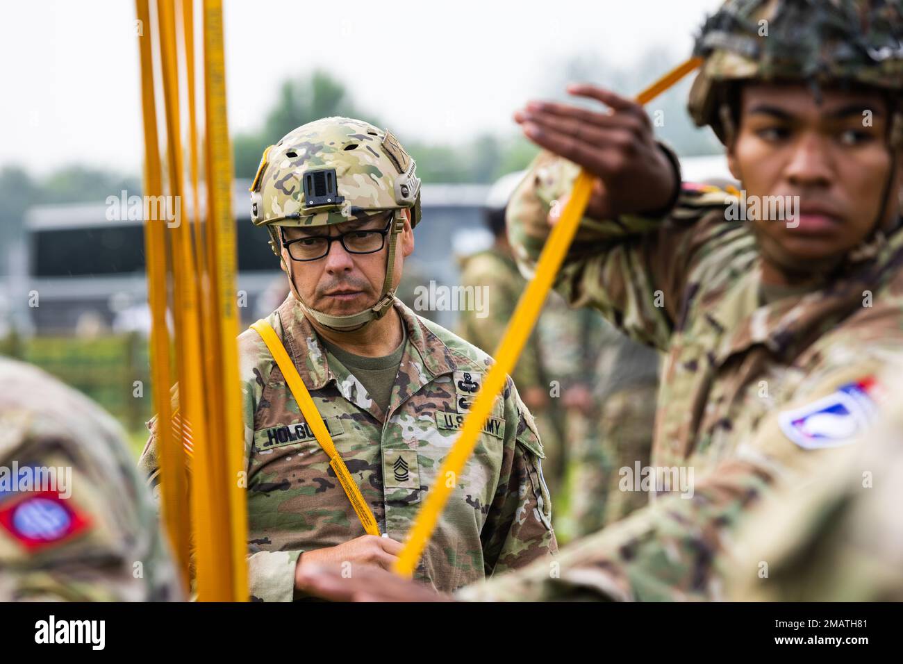 Members of Special Operations Command Europe prepare for a static line ...