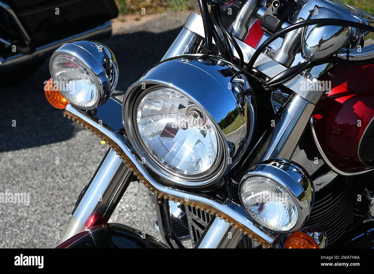 The chrome on Dwight Jackson's Harley Davidson motorcycle catches the ...