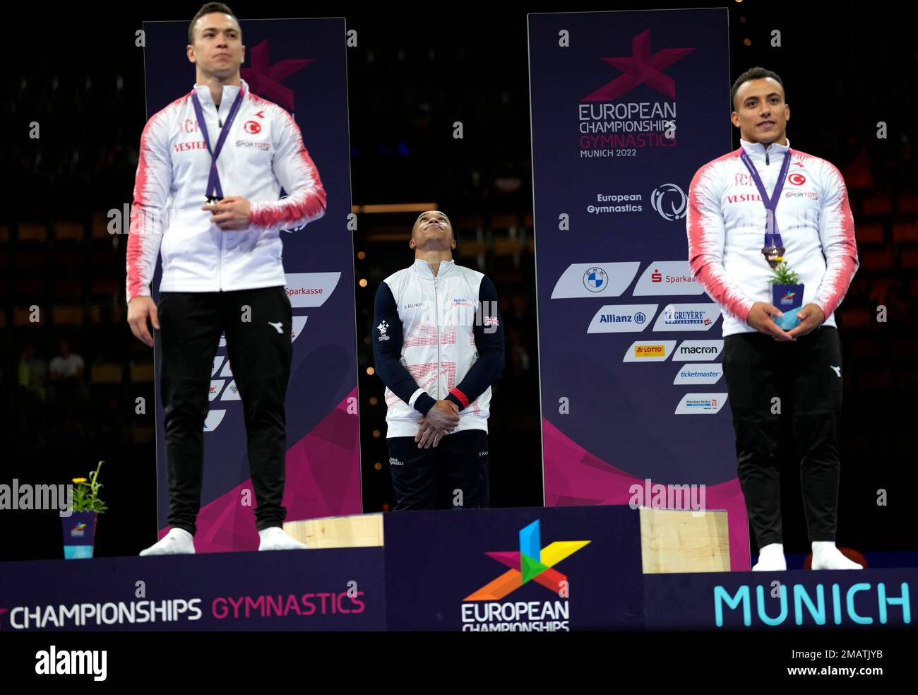 Silver medalist Turkey's Ahmet Under, left, gold medalist England's Joe ...