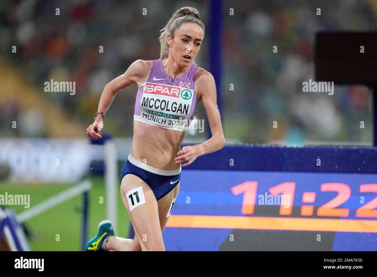 Eilish McColgan, of Great Britain, runs to win the bronze medal in the ...