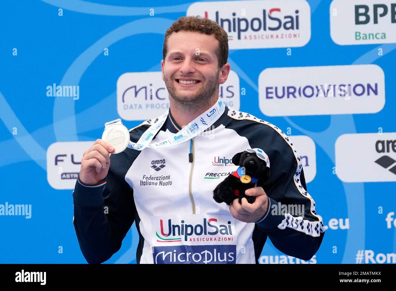 Lorenzo Marsaglia of Italy celebrates on the podium after winning the ...