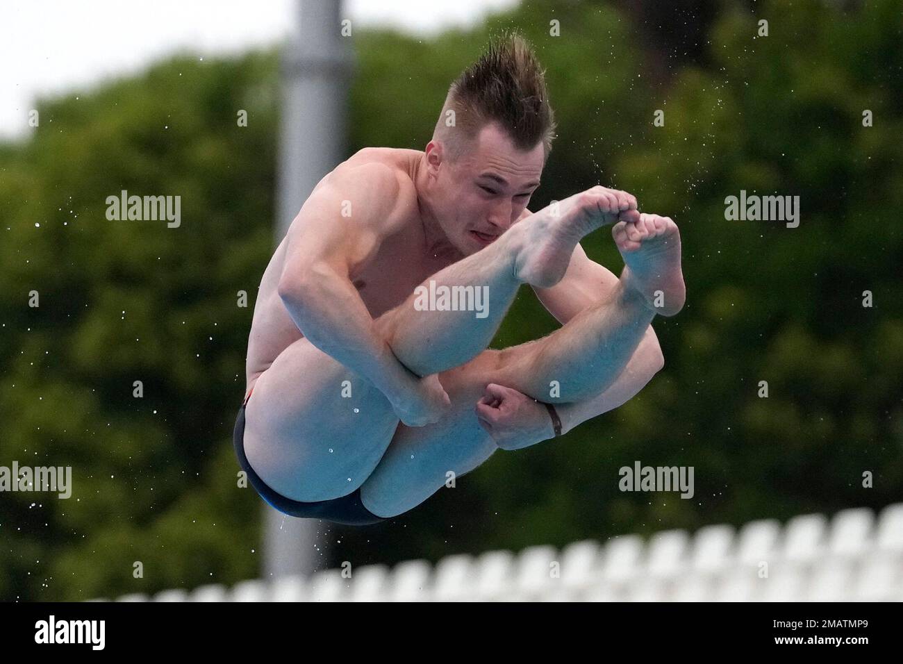 Jack Laugher of Britain competes during Men's diving 1m springboard ...