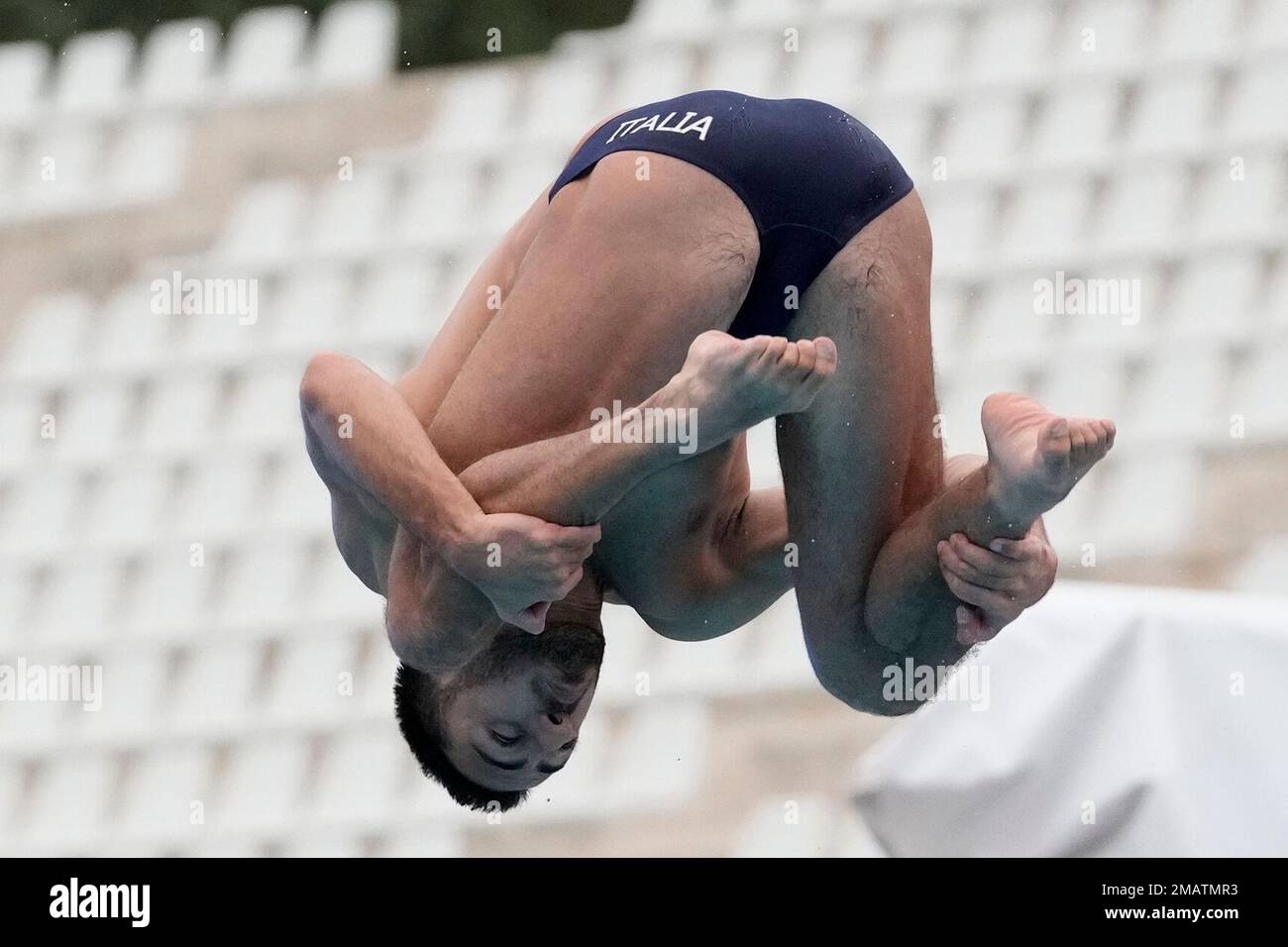 Giovanni Tocci of Italy competes during Men's diving 1m springboard ...