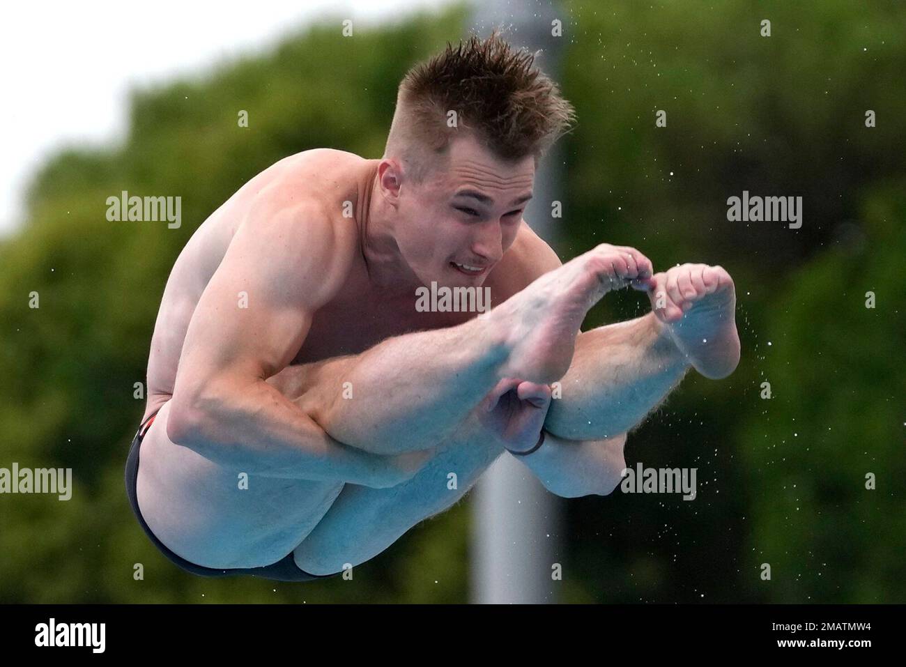 Jack Laugher of Britain competes during Men's diving 1m springboard ...