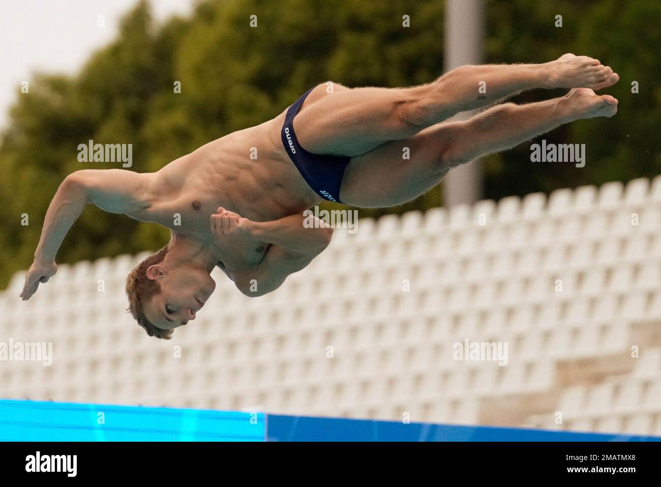 Moritz Wasemann of Germany competes during Men's diving 1m springboard ...