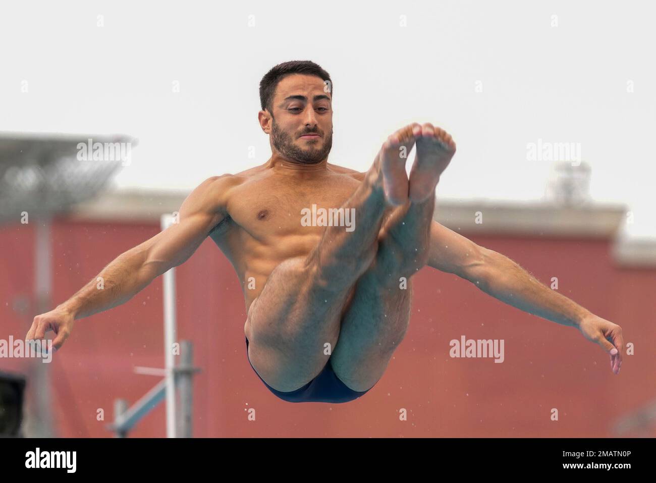 Giovanni Tocci of Italy competes during Men's diving 1m springboard ...