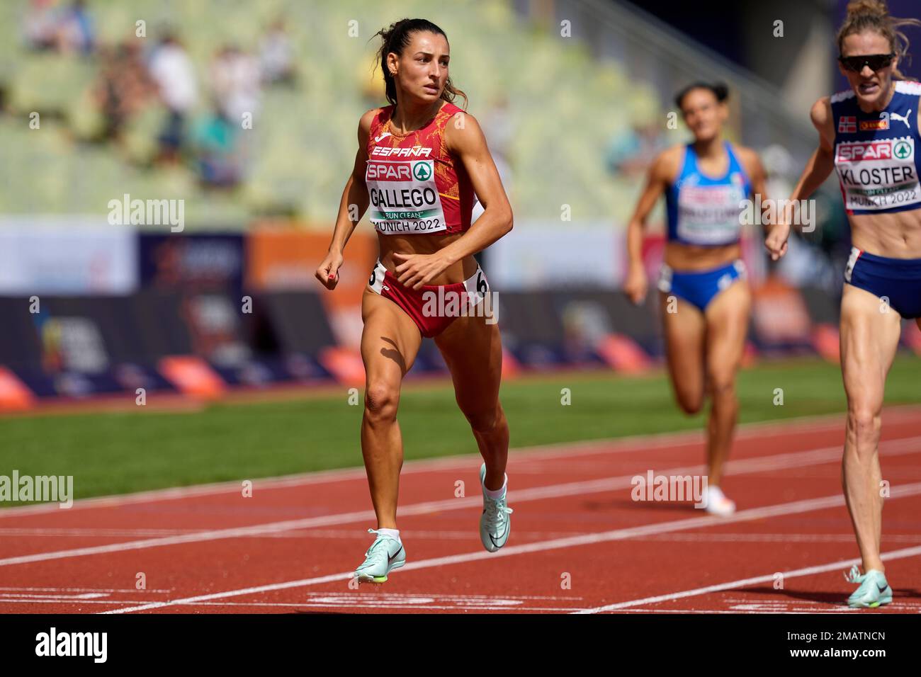 Sara Gallego, of Spain, left, wins a Women's 400 meters hurdles ...