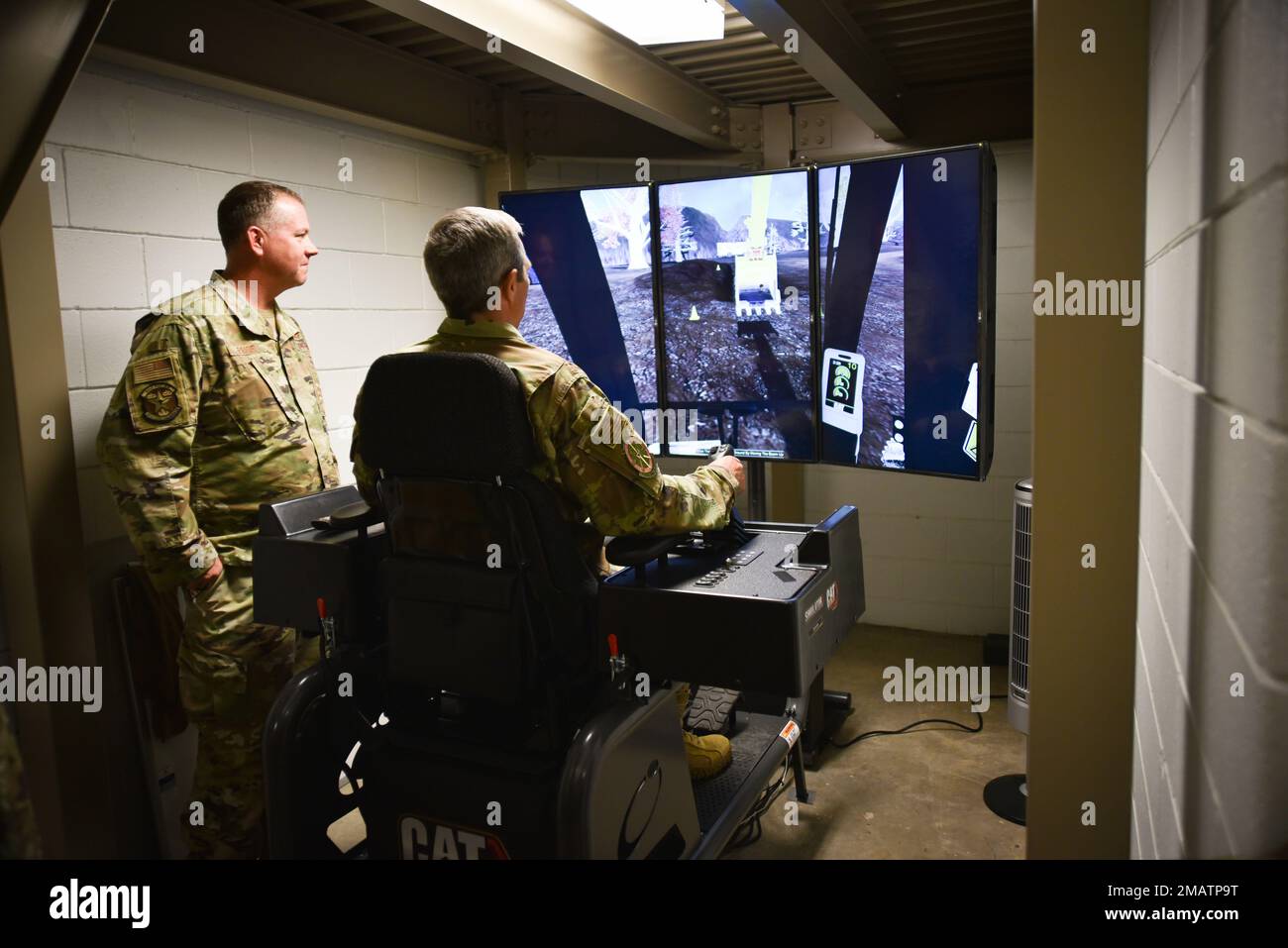 Maj. Gen Bryan R. Radliff (right), 10th Air Force commander, tests an ...
