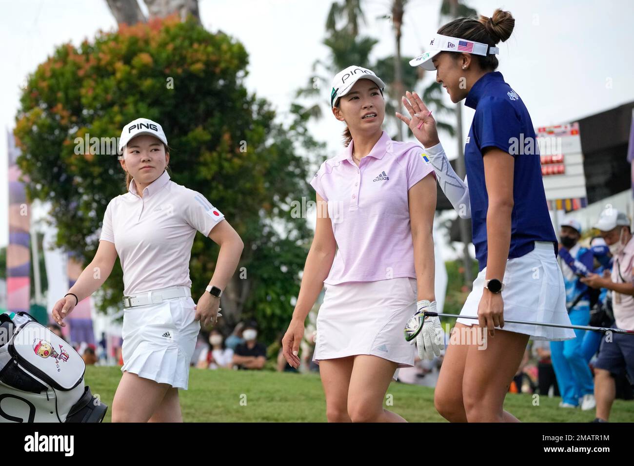 Japan's Hinako Shibuno, center, and her sister Kiriko, left, talk to Eimi Koga of the US during ...