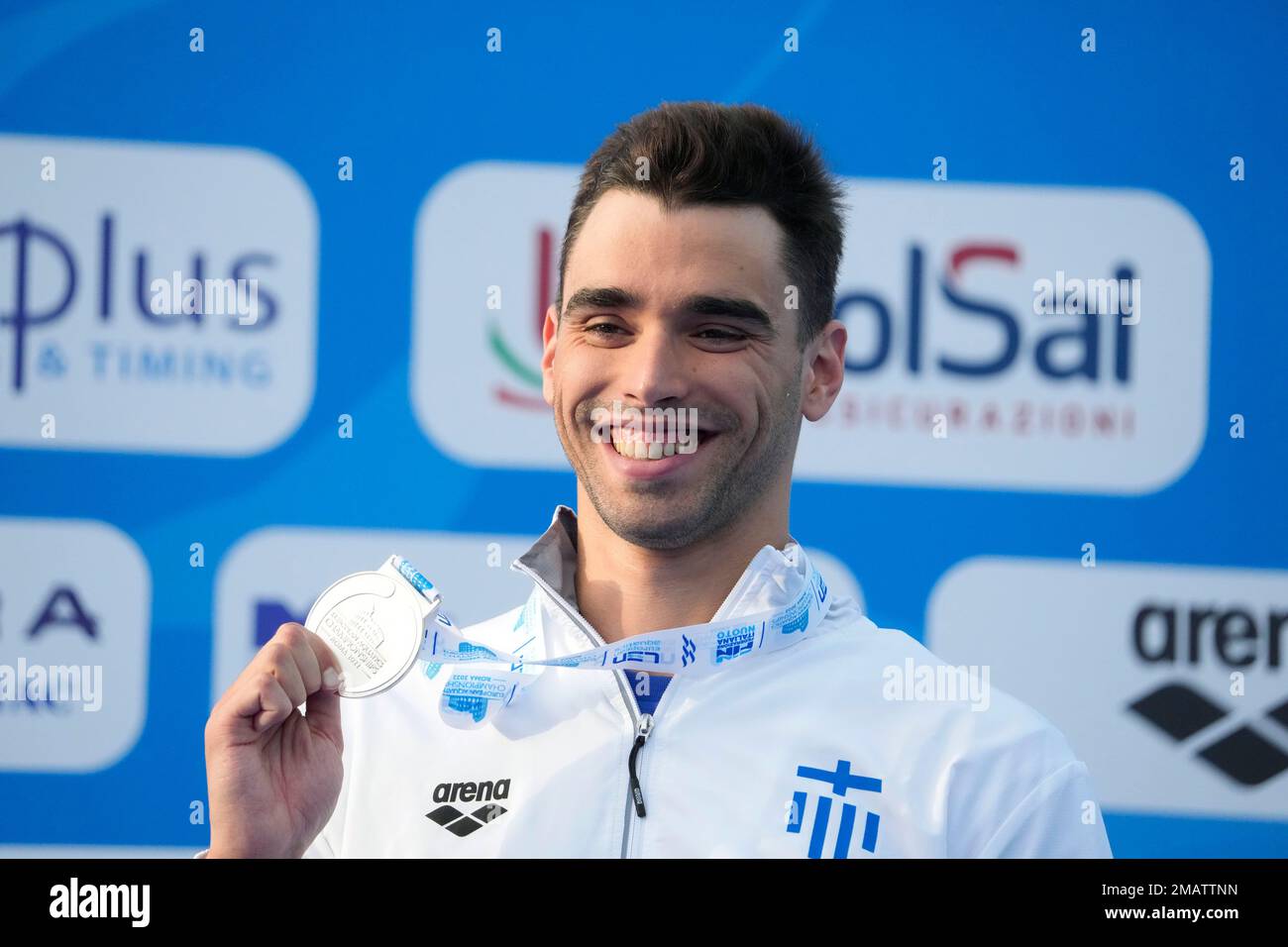 Apostolos Christou of Greece holds his silver medal on the podium of ...