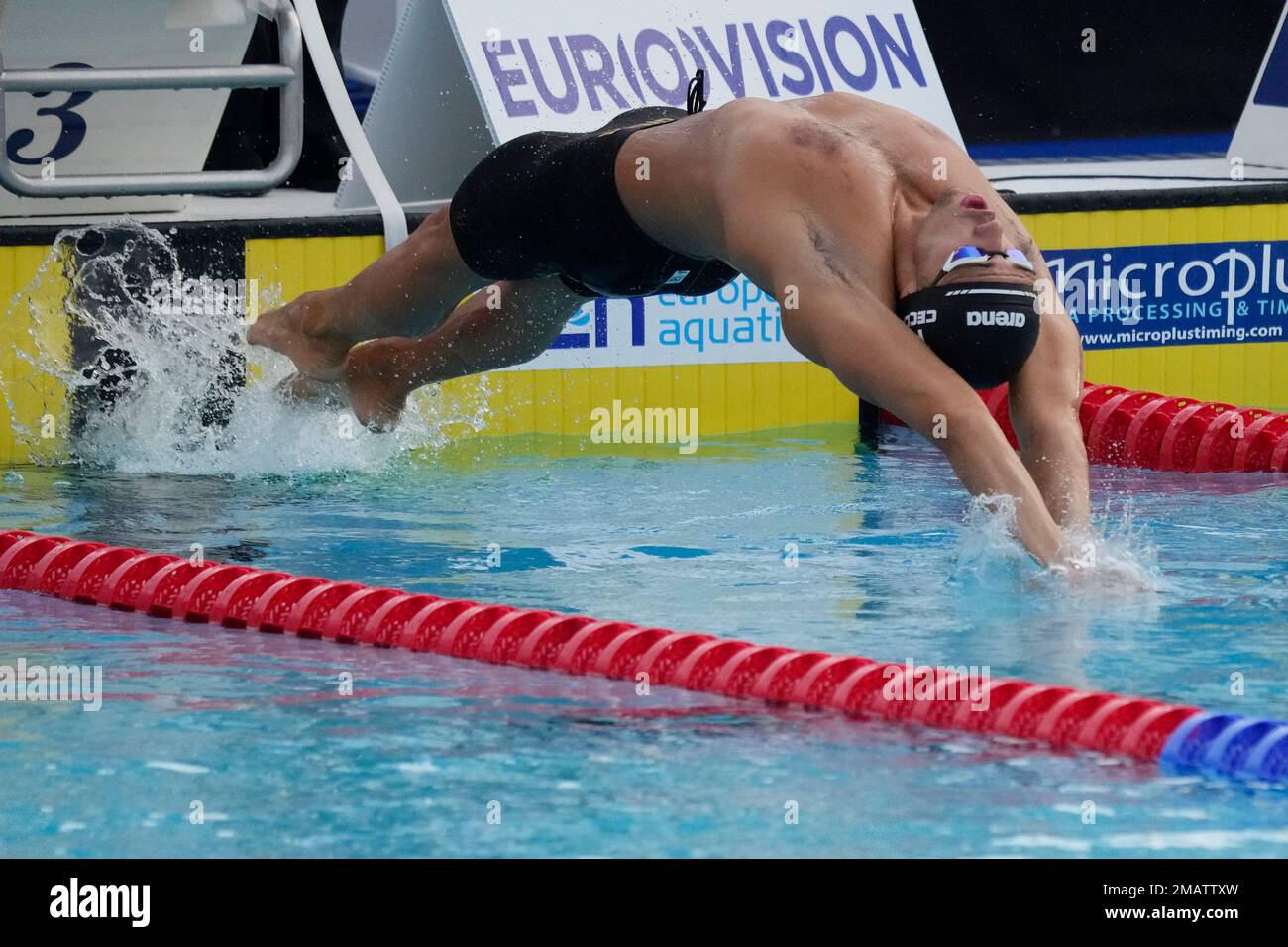 Thomas Ceccon of Italy competes in the Men's 100m backstroke final at ...