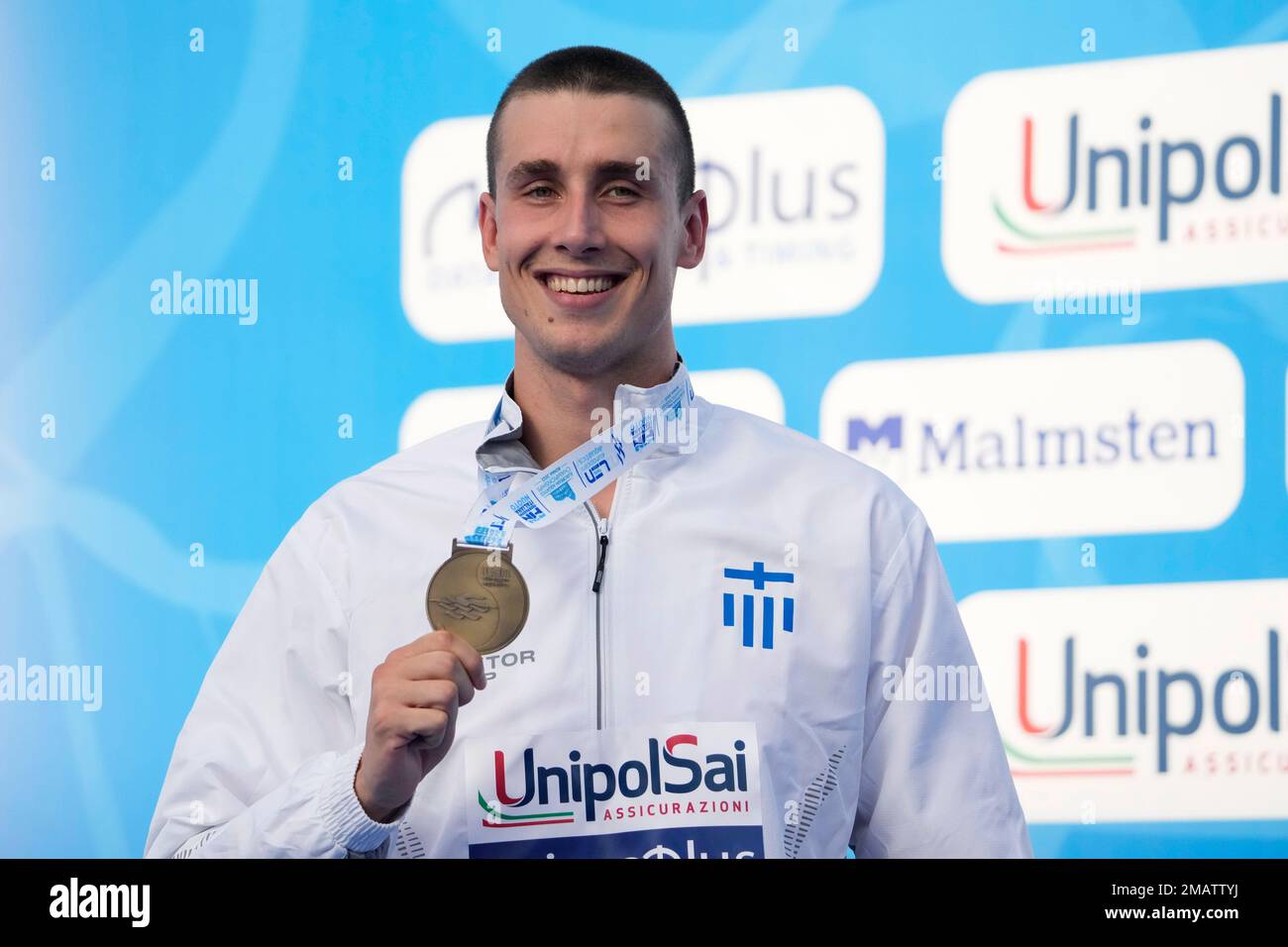 Kristian Gkolomeev of Greece celebrates holding his bronze medal on the ...