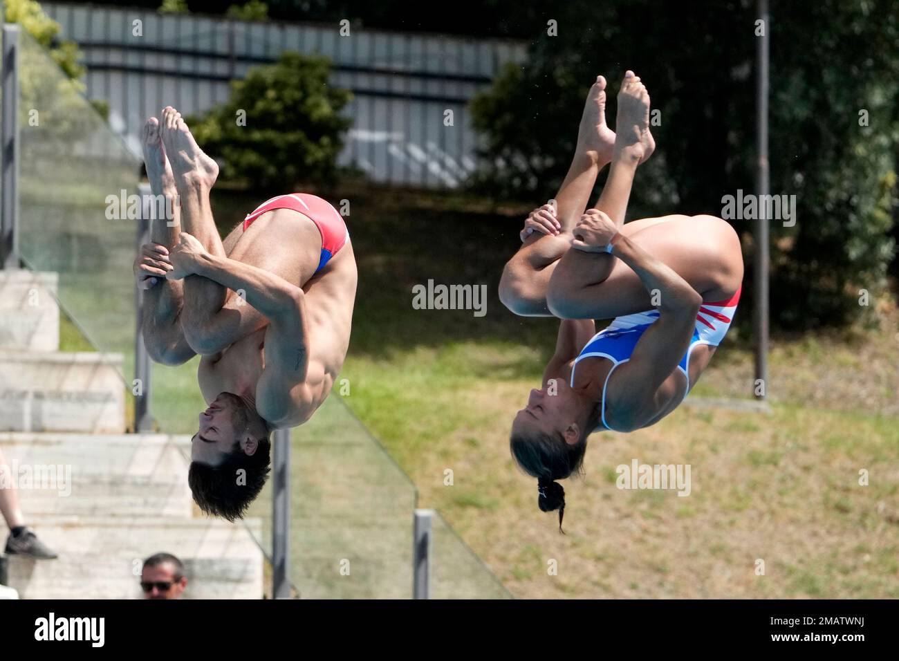 Jules Bouyer, left and Nais Gillet of France compete during the mixed ...