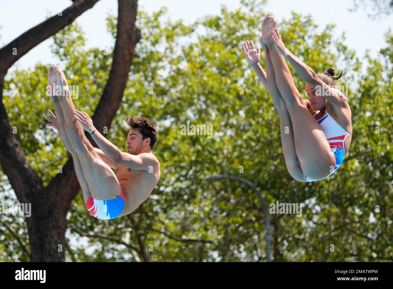 Jules Bouyer, left and Nais Gillet of France compete during the Mixed ...