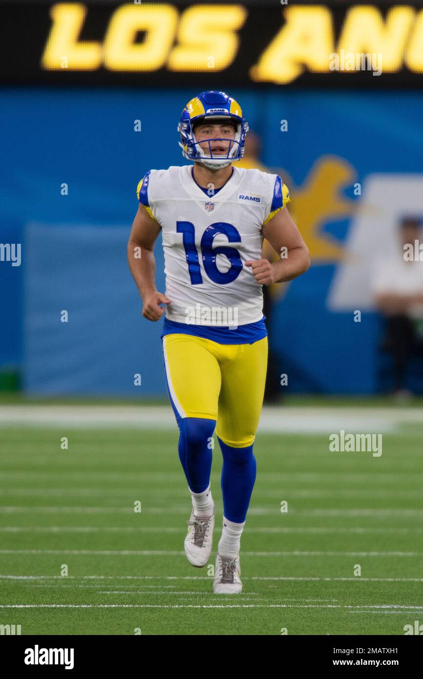 Los Angeles Rams punter Cameron Dicker (16) runs up the field after ...