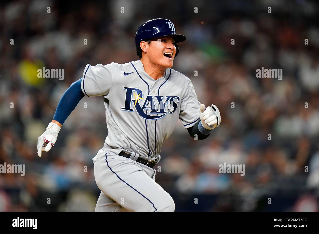 Tampa Bay Rays' Yu Chang, of Taiwan, runs to first base during the ...