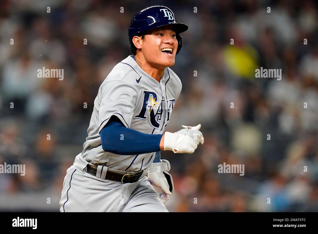 Tampa Bay Rays' Yu Chang, of Taiwan, runs to first base during the ...