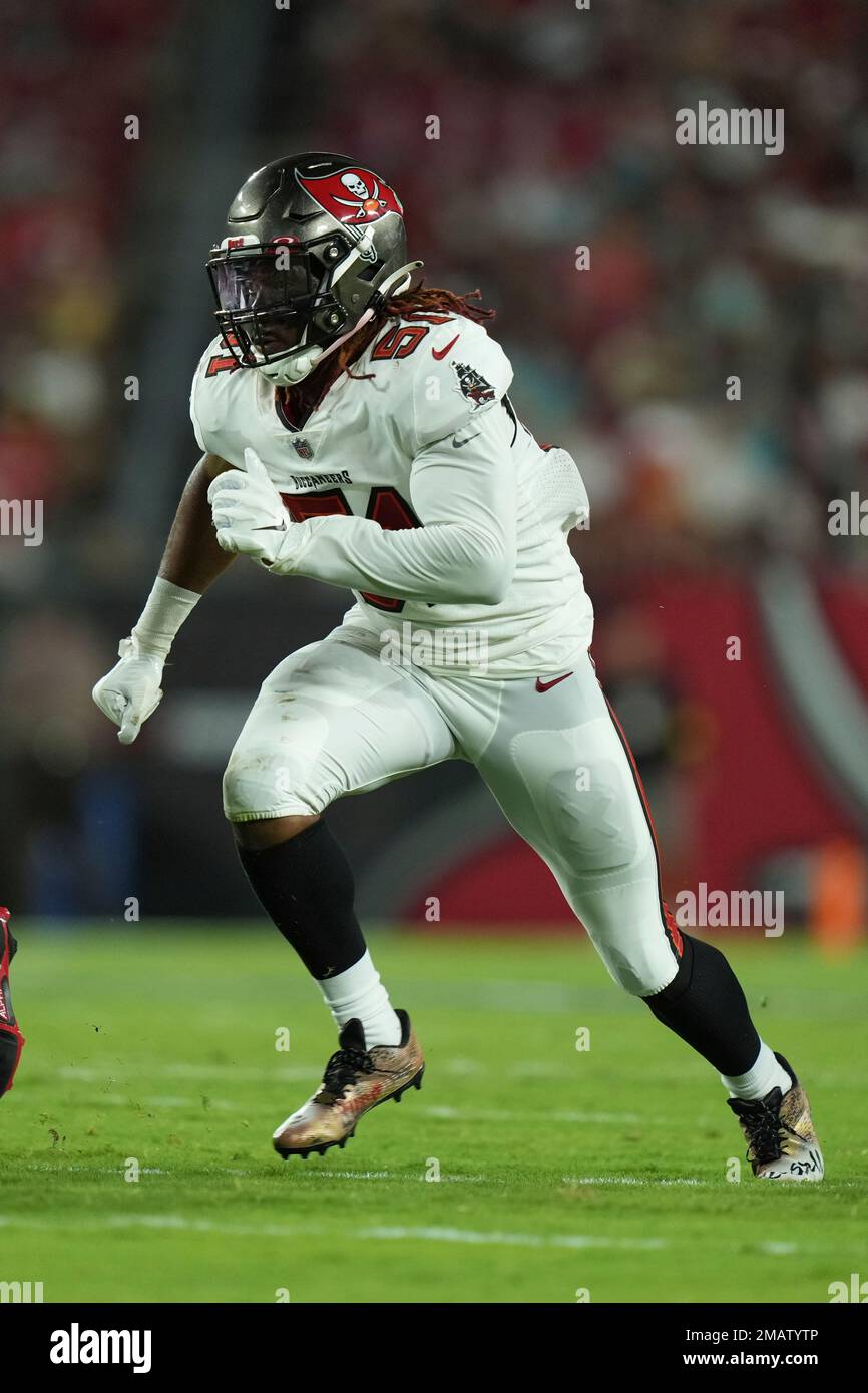 Miami Dolphins linebacker J.J. Russell (51) rushes the quarterback ...