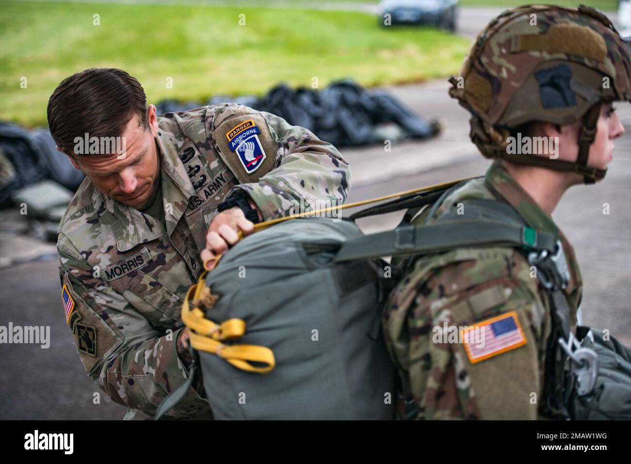 A U.S. Army jumpmaster assigned to the 173rd Airborne Brigade inspects ...