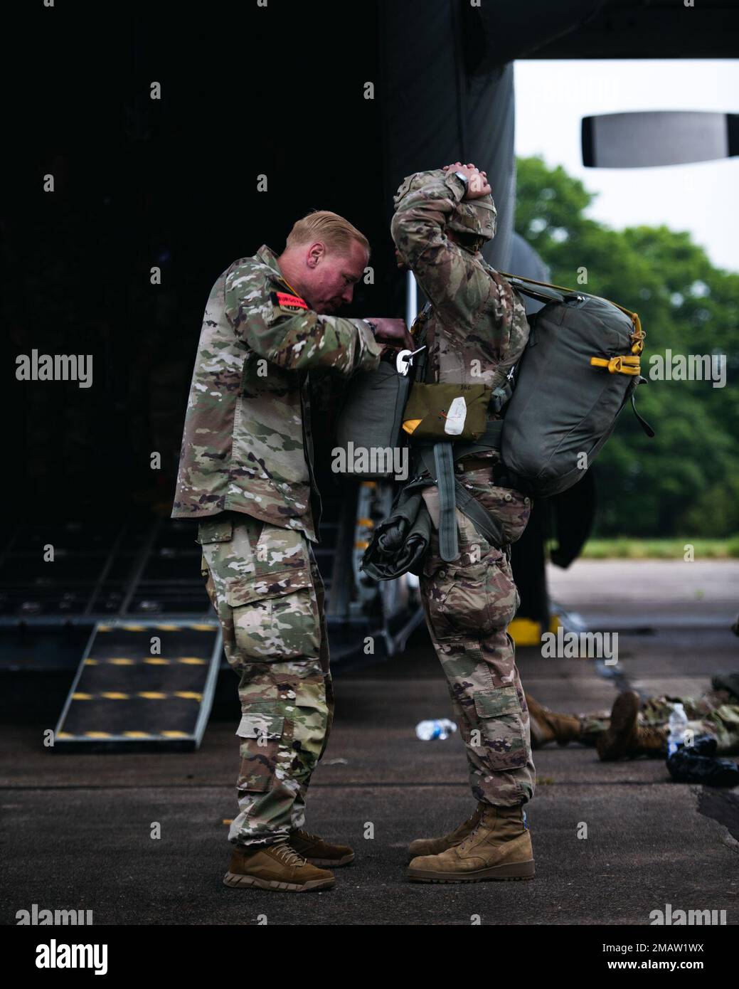 A U.S. Army jumpmaster assigned to the 173rd Airborne Brigade inspects ...