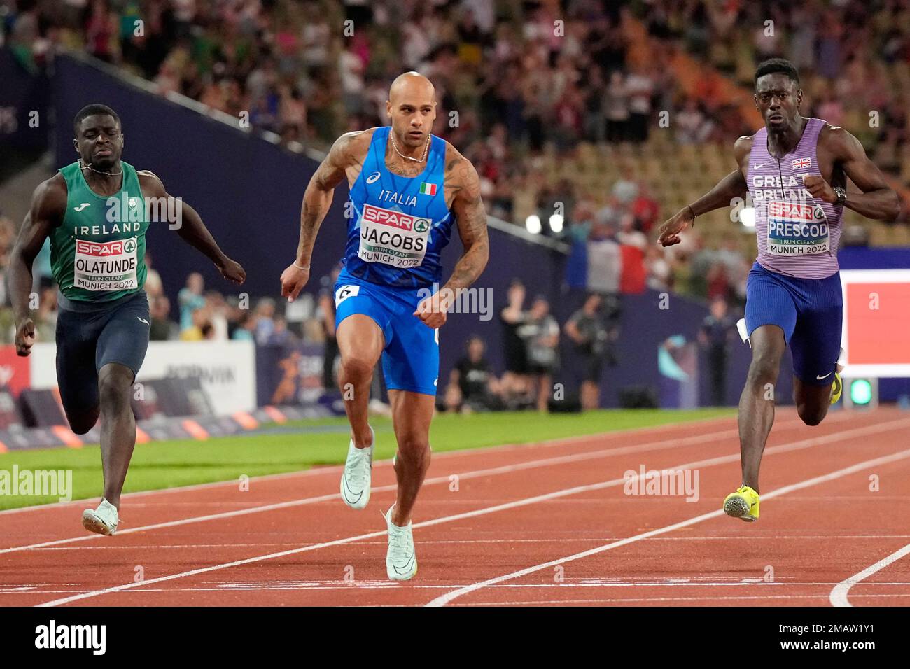 Lamont Marcell Jacobs, of Italy, center, wins the Men's 100 meters ...