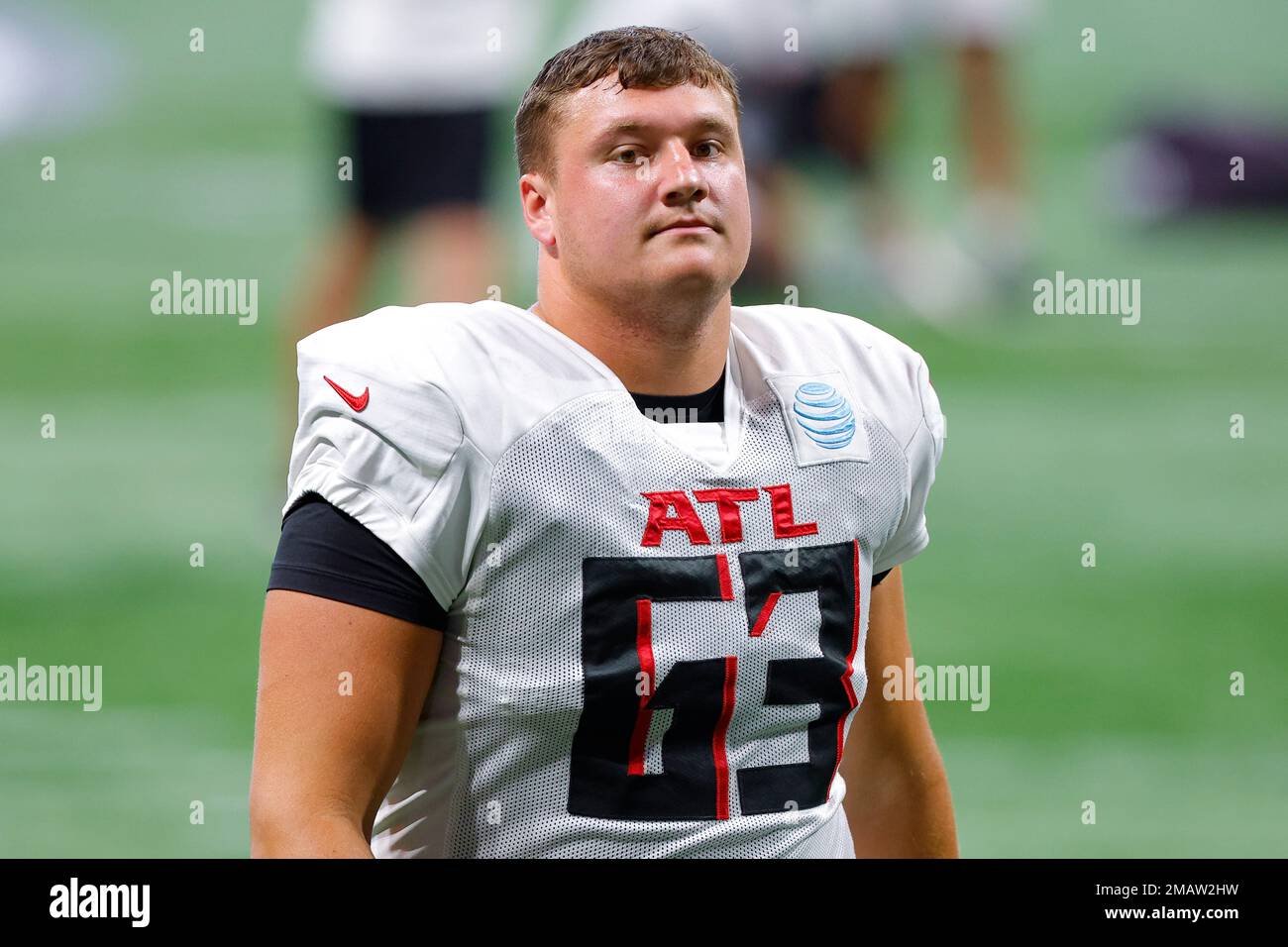 Atlanta Falcons guard Chris Lindstrom (63) warms up during the teams ...