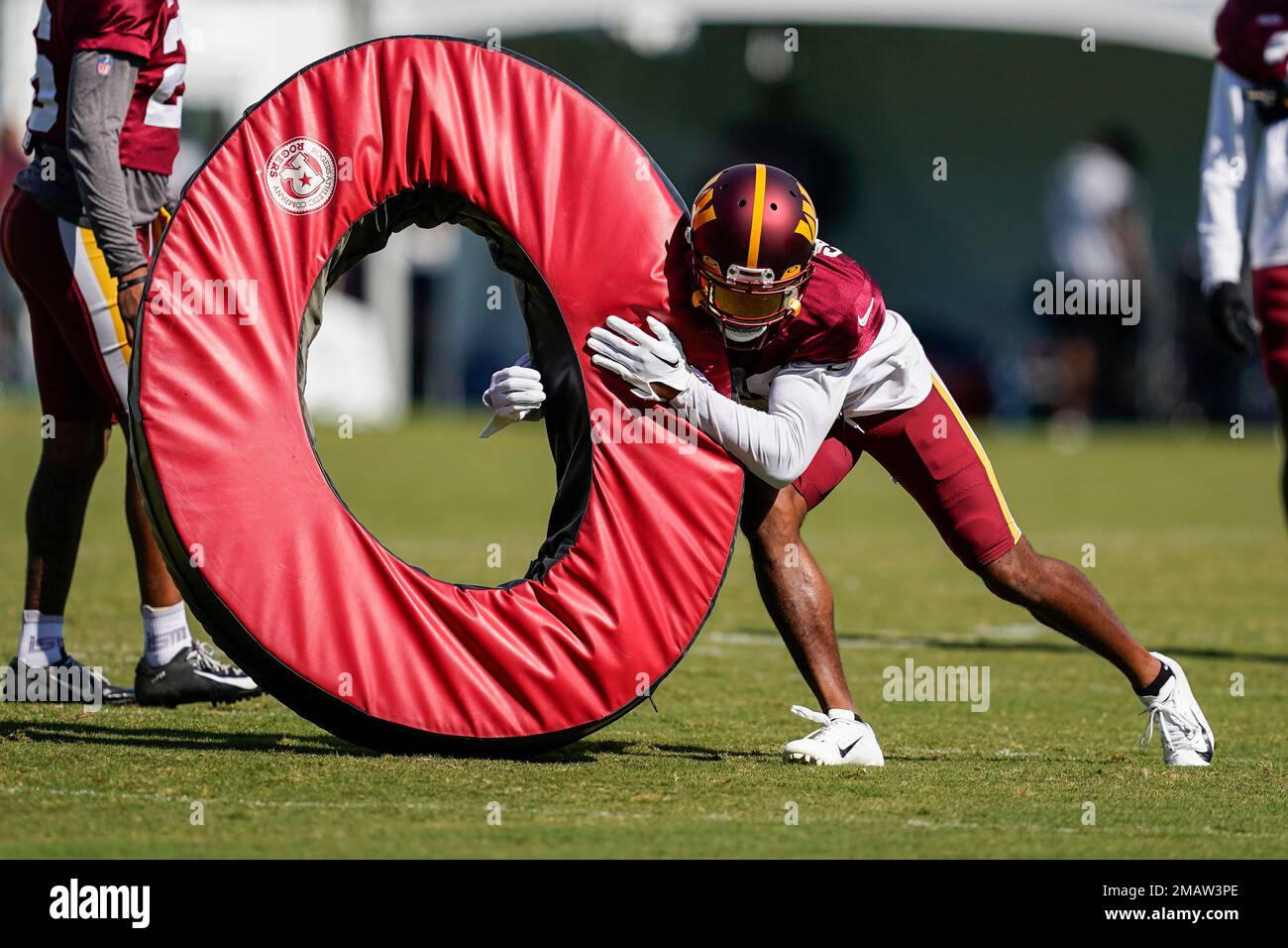 Washington Commanders cornerback Kendall Fuller (29) hits a tackling ...