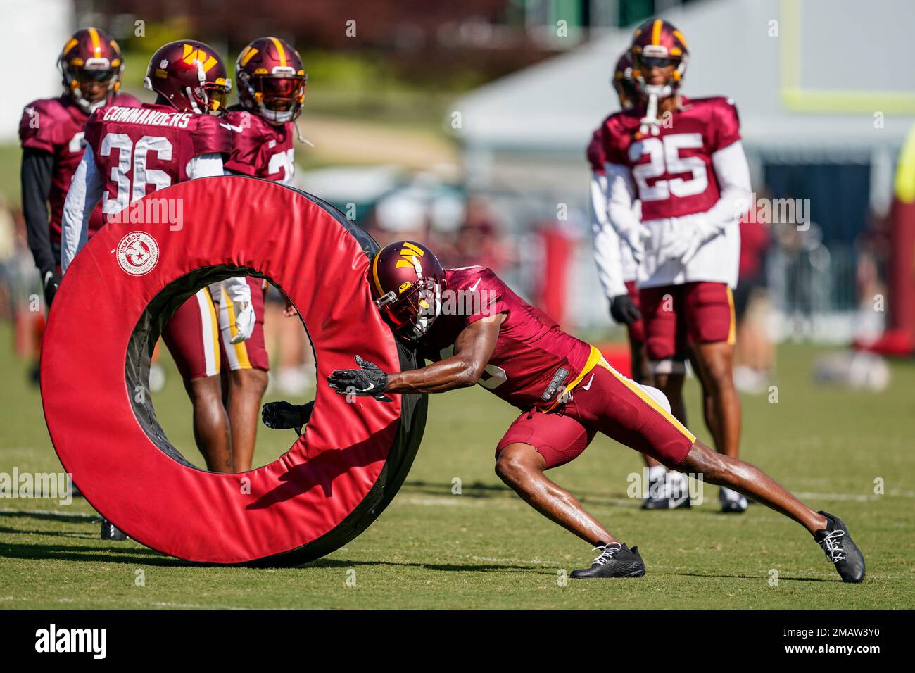 Washington Commanders cornerback William Jackson III hits a tackling ...