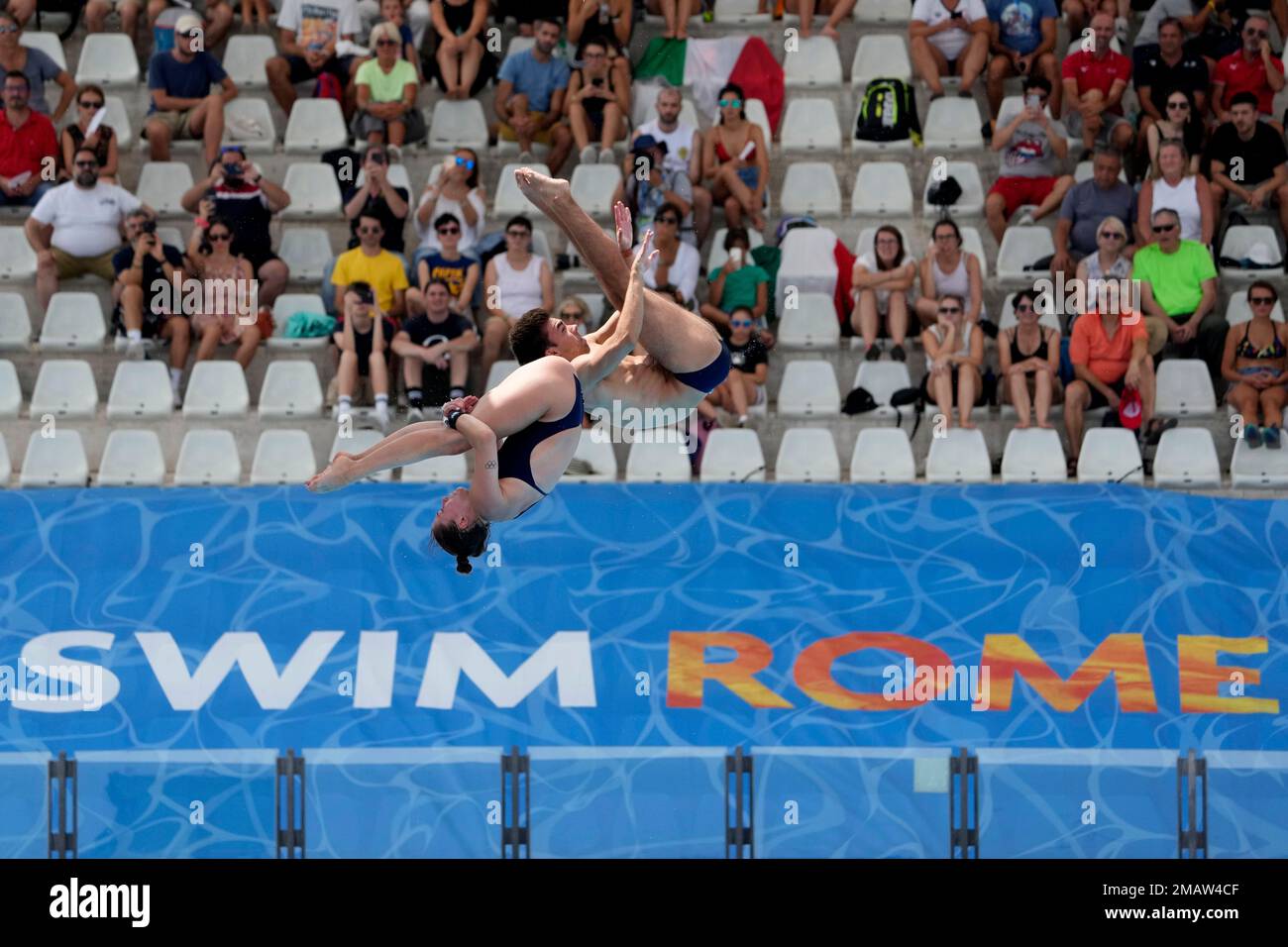 Italy's Eduard Timbretti Gugiu and Sarah Jodoin di Maria compete during ...