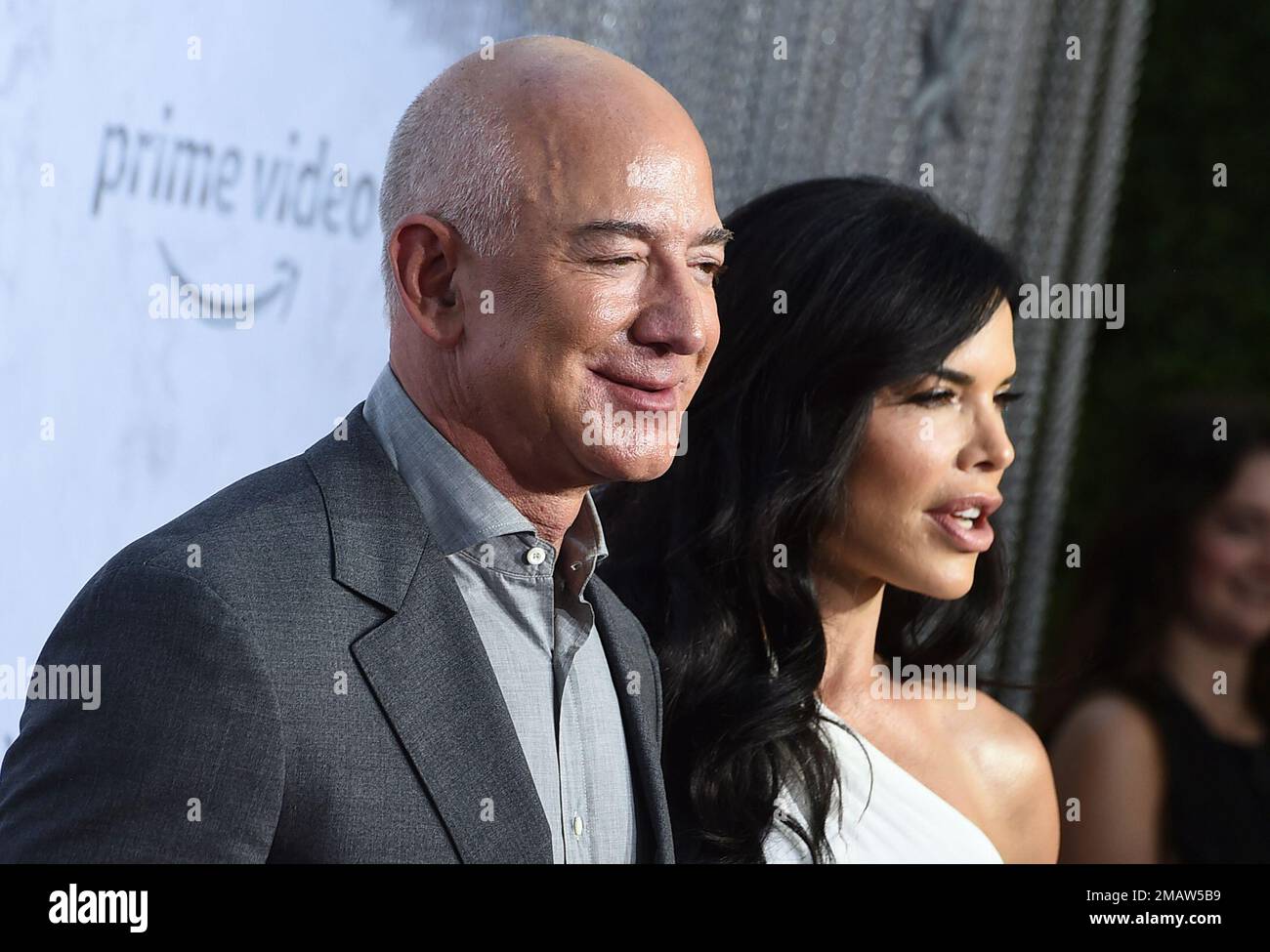 Jeff Bezos, left, and Laura Sanchez arrive at the premiere of "The Lord ...