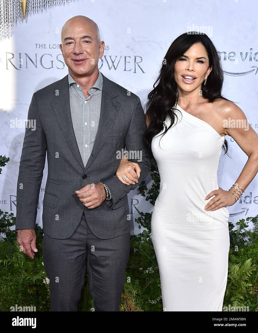 Jeff Bezos, left, and Laura Sanchez arrive at the premiere of "The Lord ...