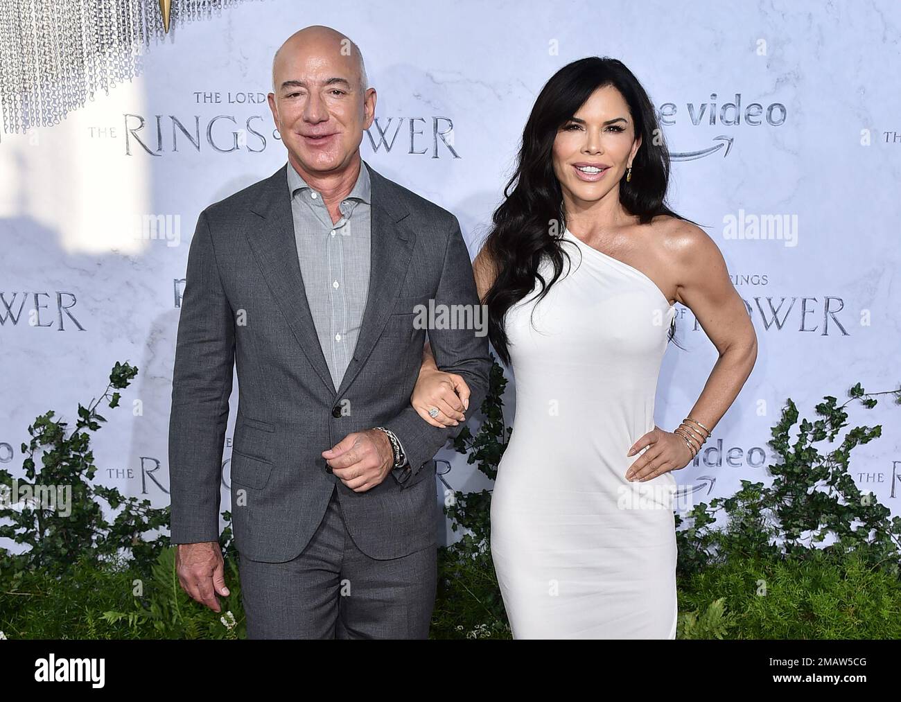 Jeff Bezos, left, and Laura Sanchez arrive at the premiere of "The Lord ...