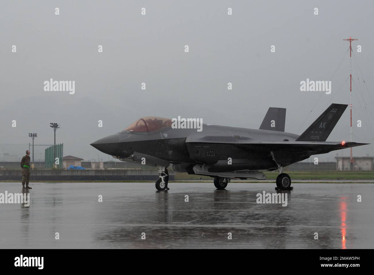 A U.S. Airman assigned to the 354th Air Expeditionary Wing prepares to ...