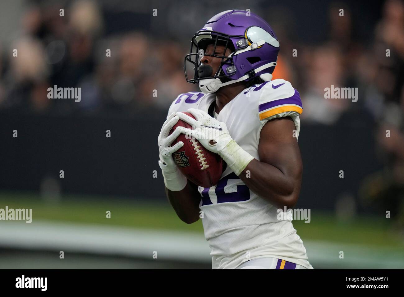 Minnesota Vikings running back Ty Chandler (32) plays against the Las ...