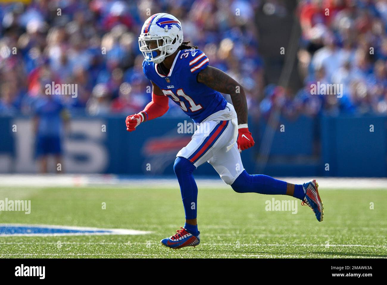 Buffalo Bills safety Damar Hamlin runs on the field during the first ...