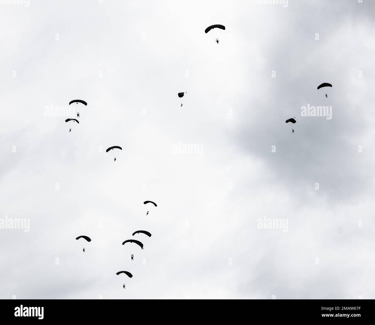 U.S. Army 1-10 Special Forces Group soldiers parachute to a drop zone ...