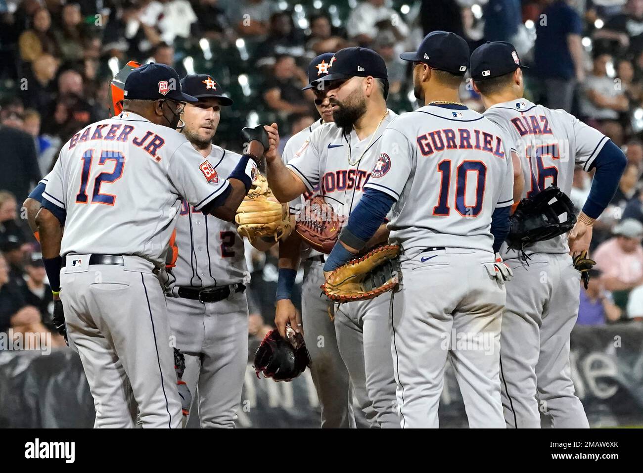 Houston Astros manager Dusty Baker Jr. fist bumps starting pitcher Jose ...