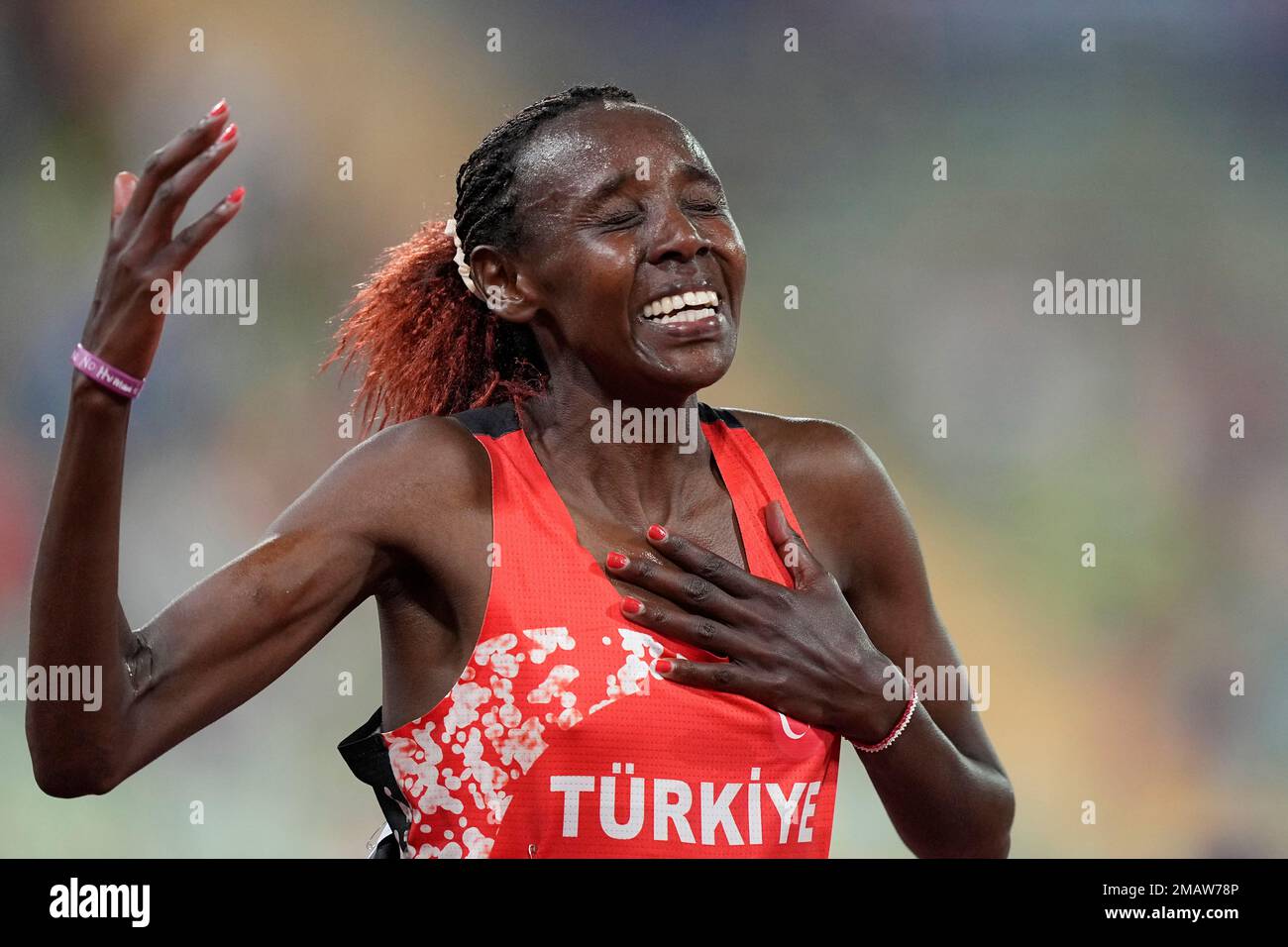 Yasemin Can, of Turkey, reacts after winning the gold medal in the ...