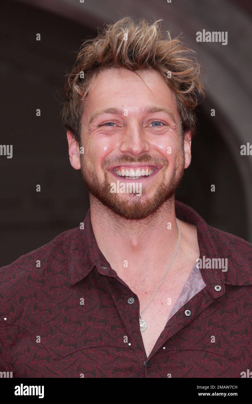 Sam Thompson poses for photographers upon arrival for the premiere of ...
