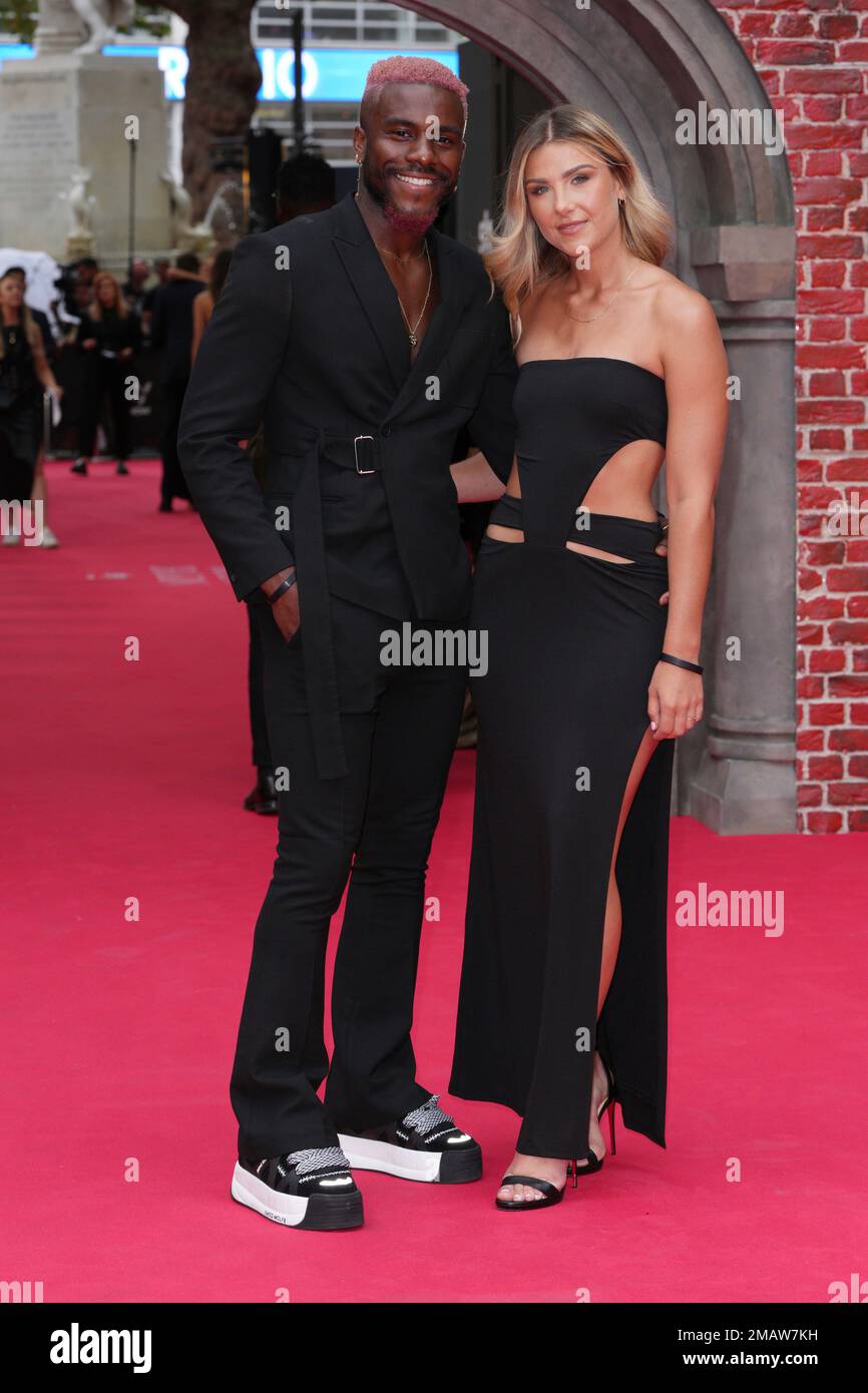 Luke Trotman and Chelsea Menna pose for photographers upon arrival at ...