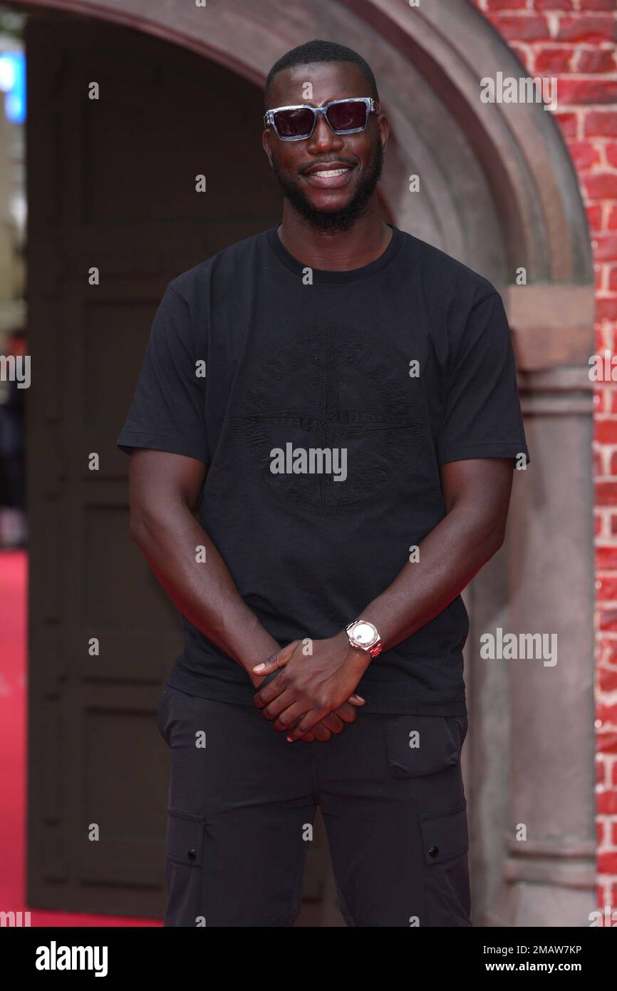 Harry Pinero poses for photographers upon arrival for the premiere of ...
