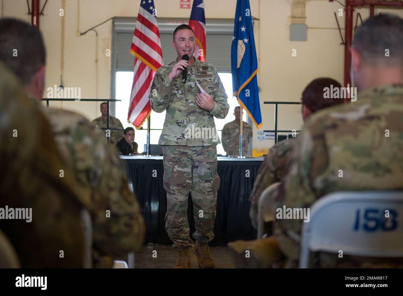 U.S. Air Force Col. Pete Boone, commander, 156th Wing, speaks to Airmen ...