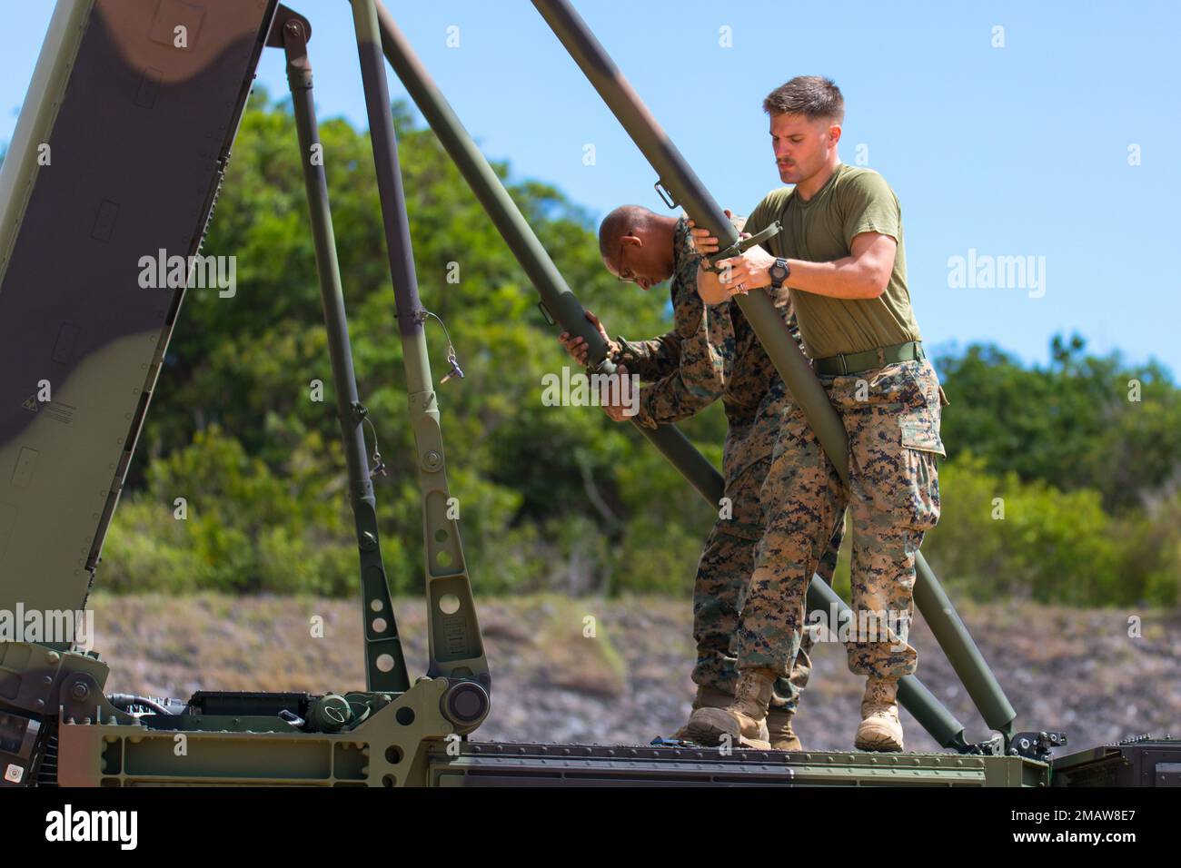 U.S. Marines with Marine Air Control Group (MACG) 18 set up an AN/TPS ...