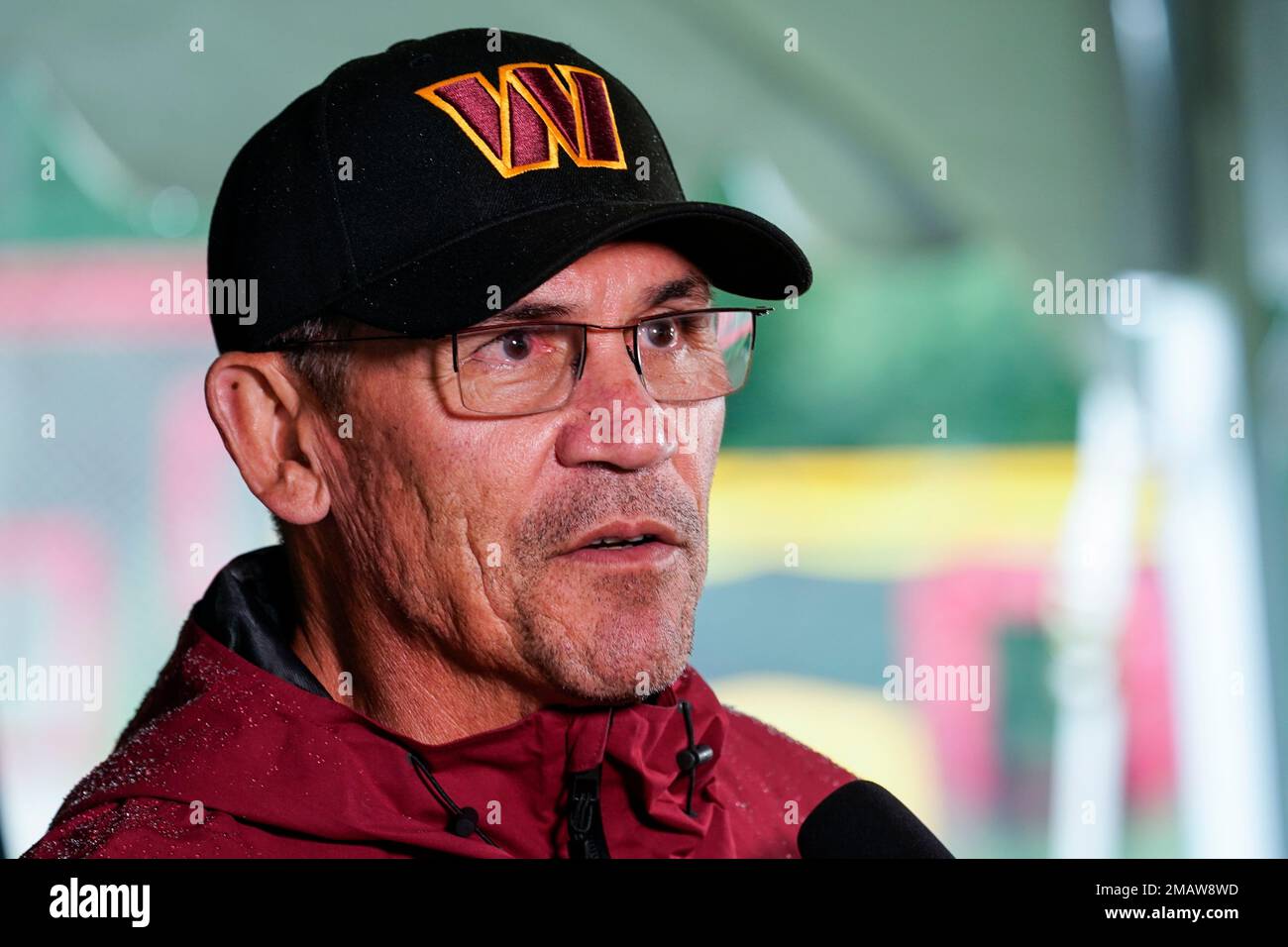 Washington Commanders coach Ron Rivera speaks with reporters after ...