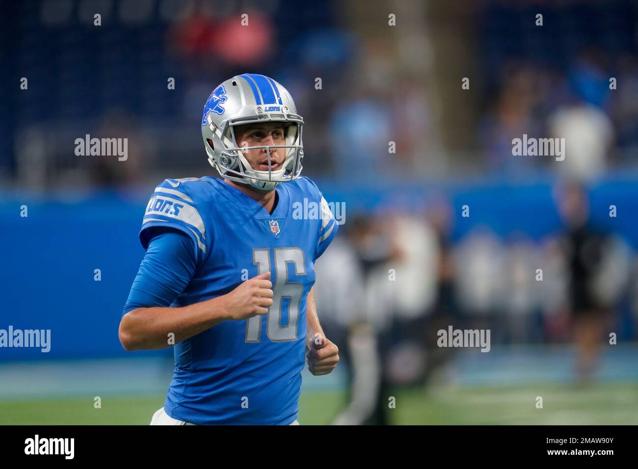 Detroit Lions quarterback Jared Goff runs onto the field during a ...