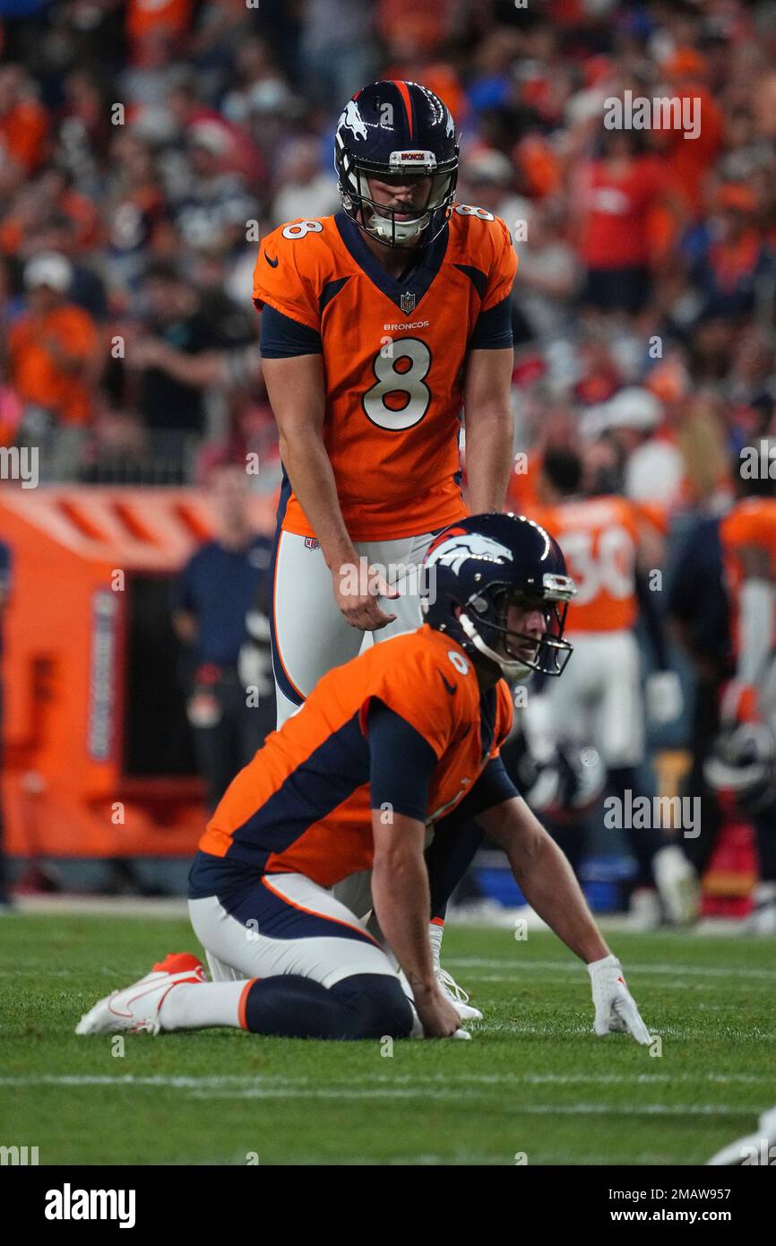Denver Broncos place kicker Brandon McManus (8) kicks against the ...