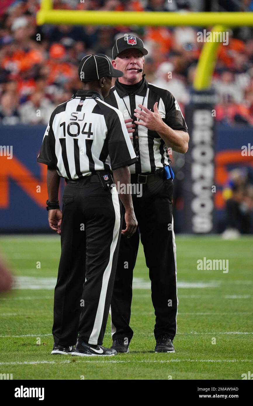 line judge Julian Mapp (10) and down judge Danny Short (113) during the ...