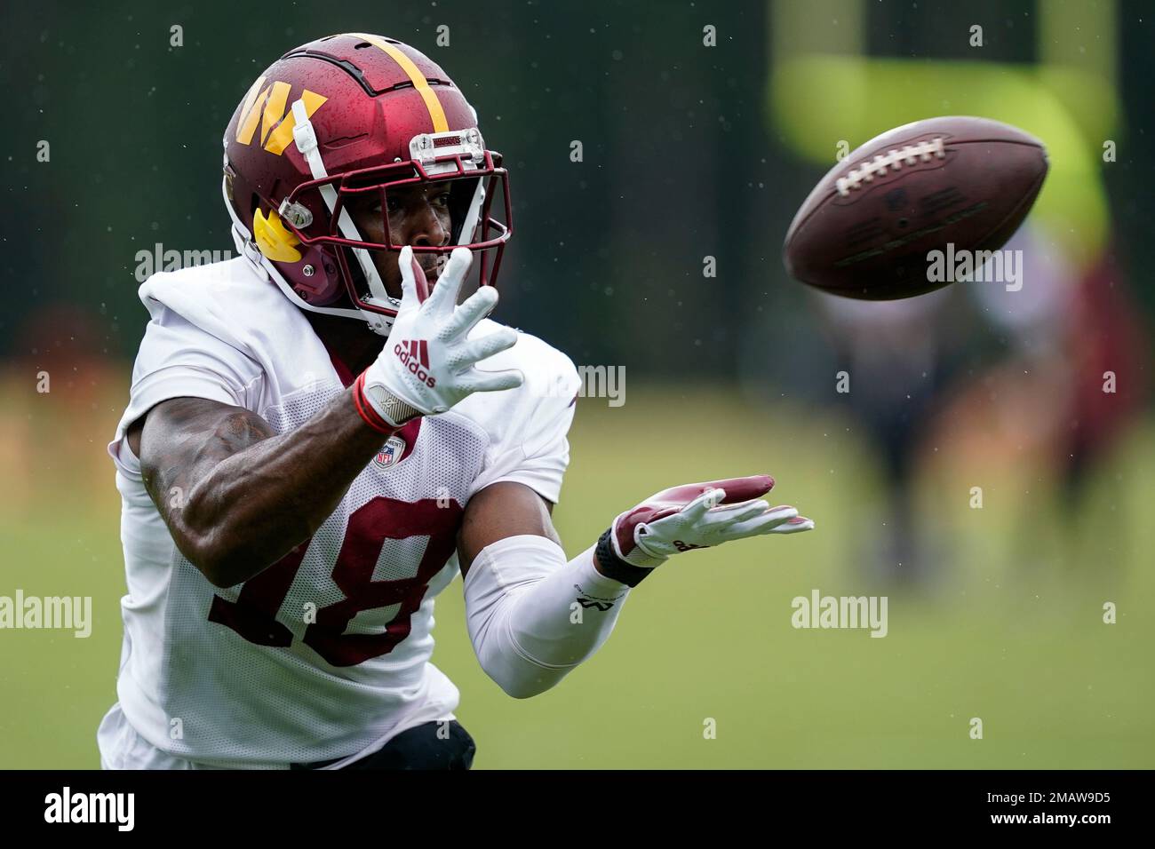 Washington Commanders wide receiver Matt Cole (18) catches the ball ...