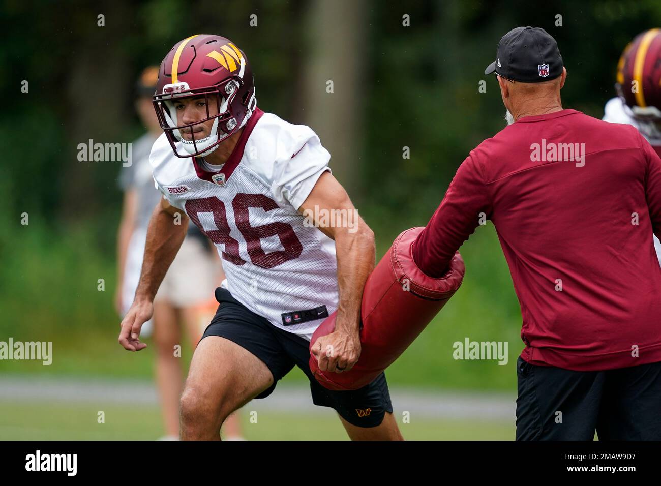 Washington Commanders wide receiver Alex Erickson (86) runs a drill ...